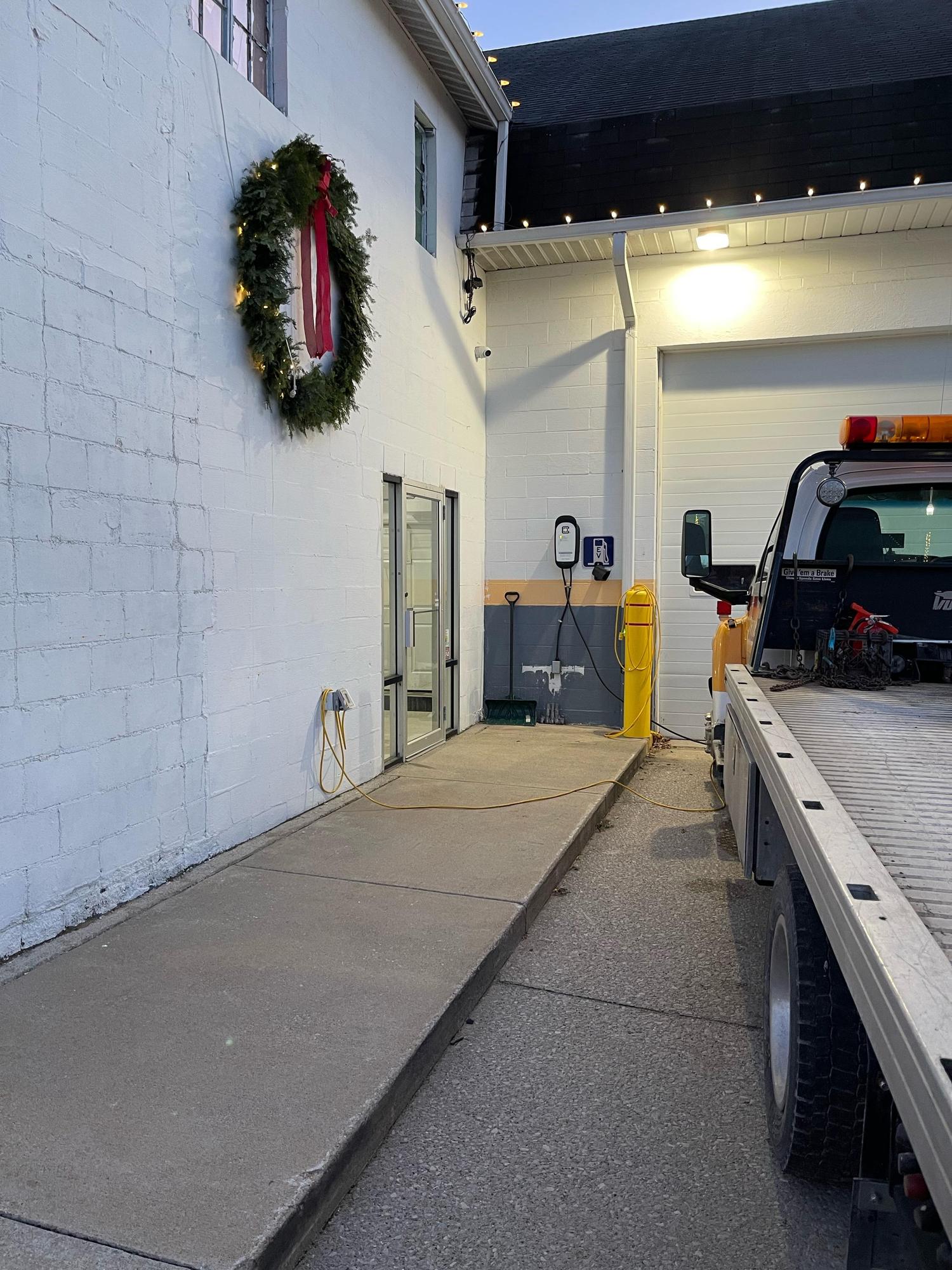 Cole’s Wrecker Service | Sanford, MI | EV Station