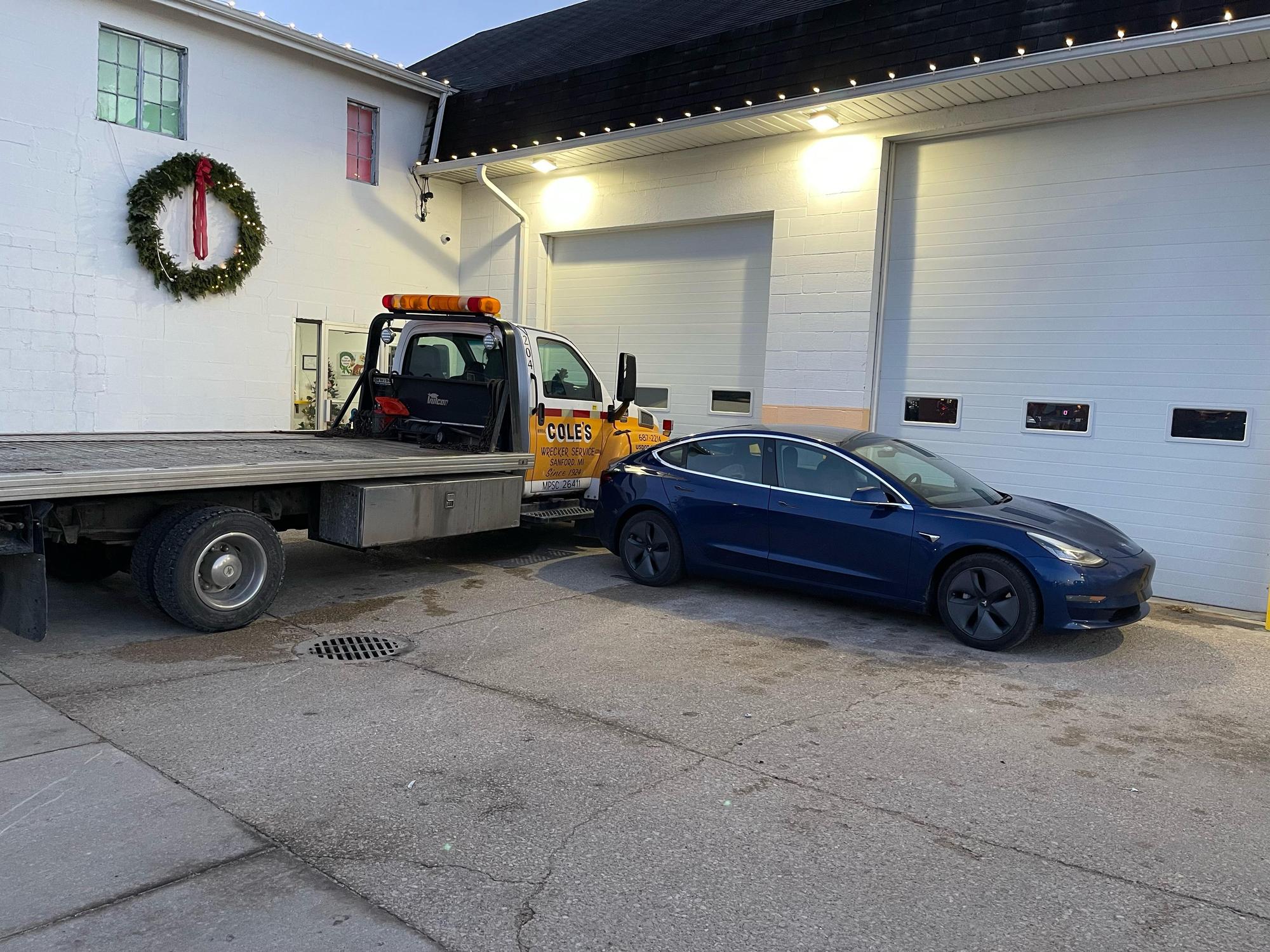 Cole’s Wrecker Service | Sanford, MI | EV Station