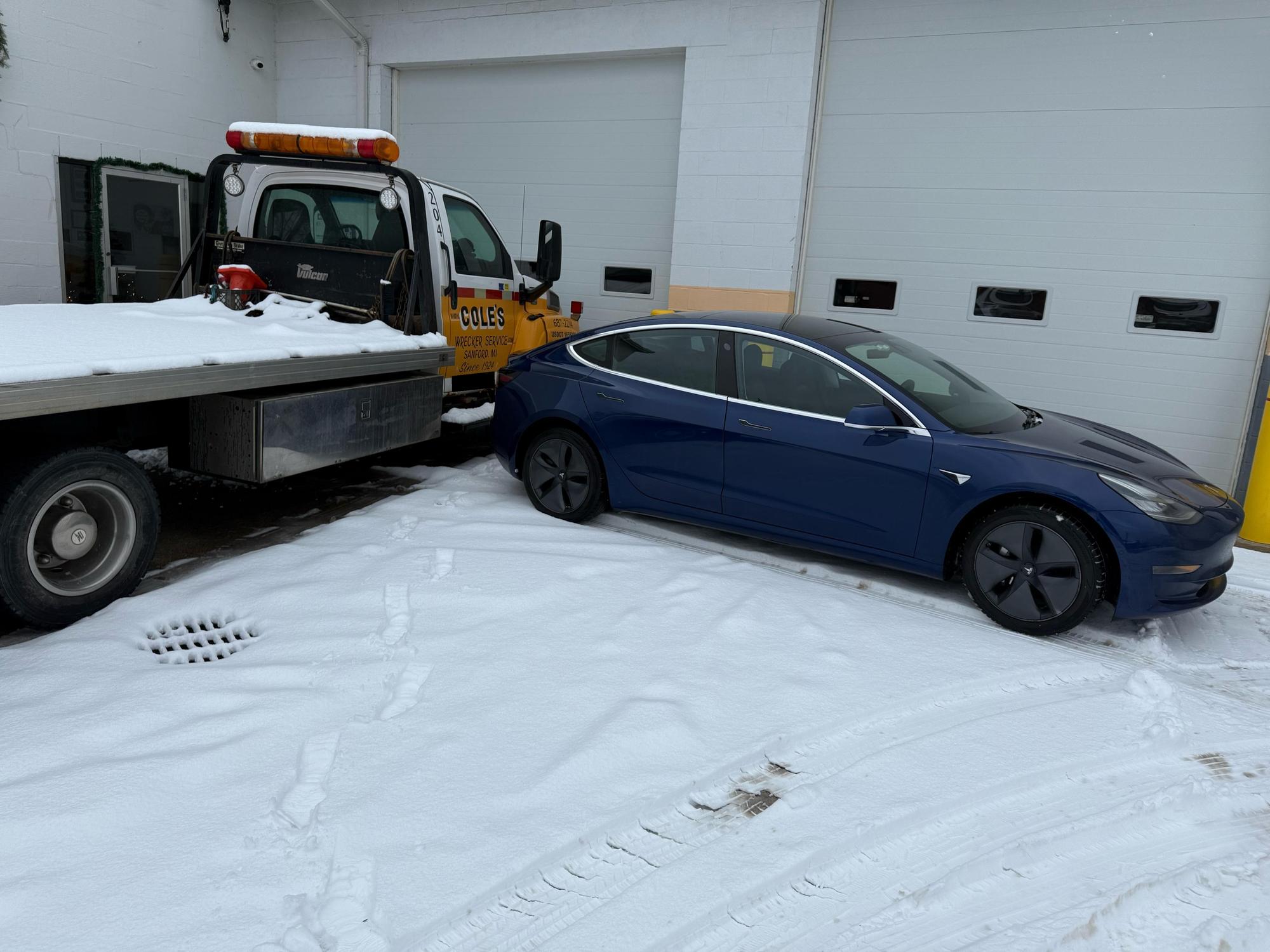 Cole’s Wrecker Service | Sanford, MI | EV Station